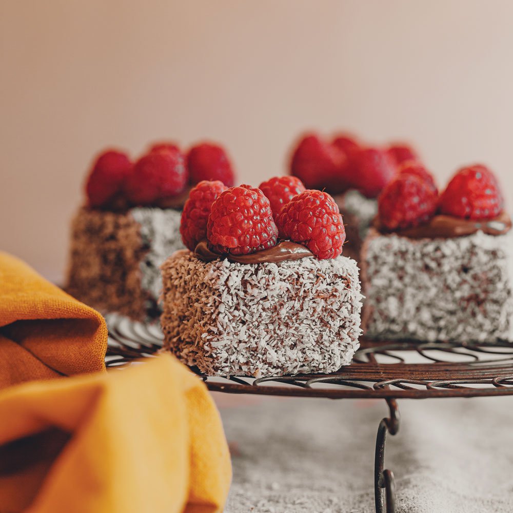 Coconut and raspberry lamingtons recipe - Spinneys UAE