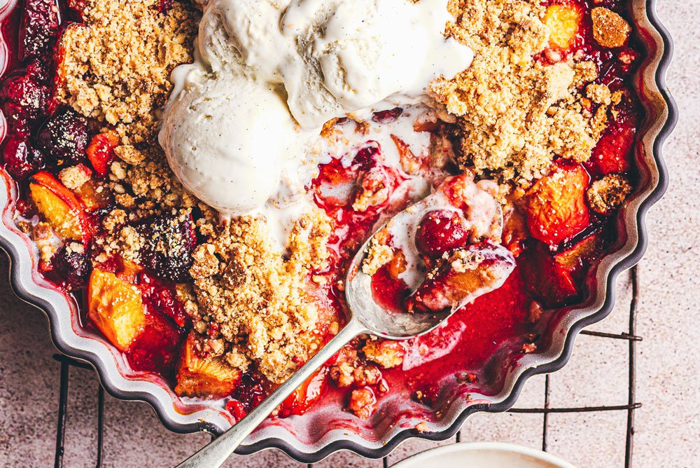 Baked stone fruit with amaretti crumble recipe - Spinneys United Arab ...