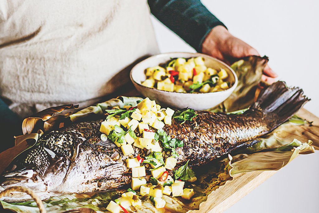 Jerk spiced whole fish with pineapple and lime salsa recipe