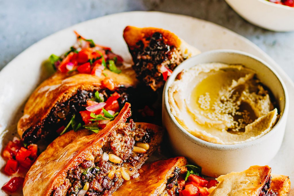 Lamb, parsley and sultana arayes with whipped lemon tahini recipe