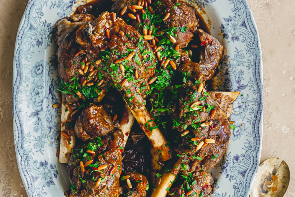 Omayah Atassi’s pomegranate braised lamb shanks recipe - Spinneys UAE
