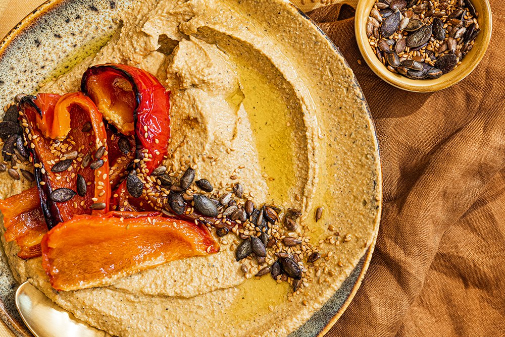 Roasted red capsicum, sumac and pumpkin seed hummus recipe - Spinneys ...