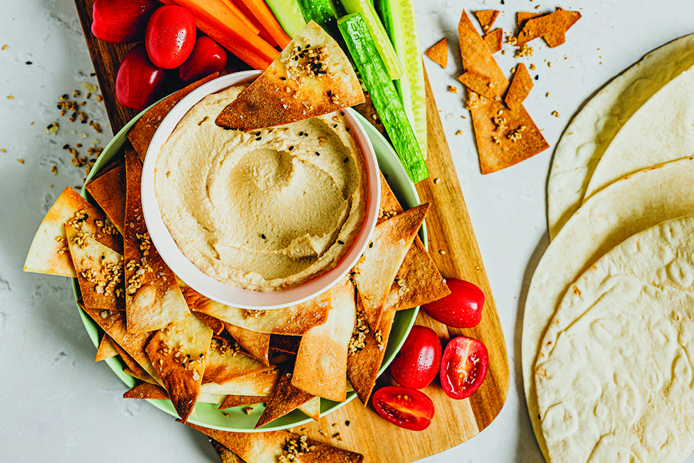 Everything bagel wrap chips with hummus and crudités recipe - Spinneys ...