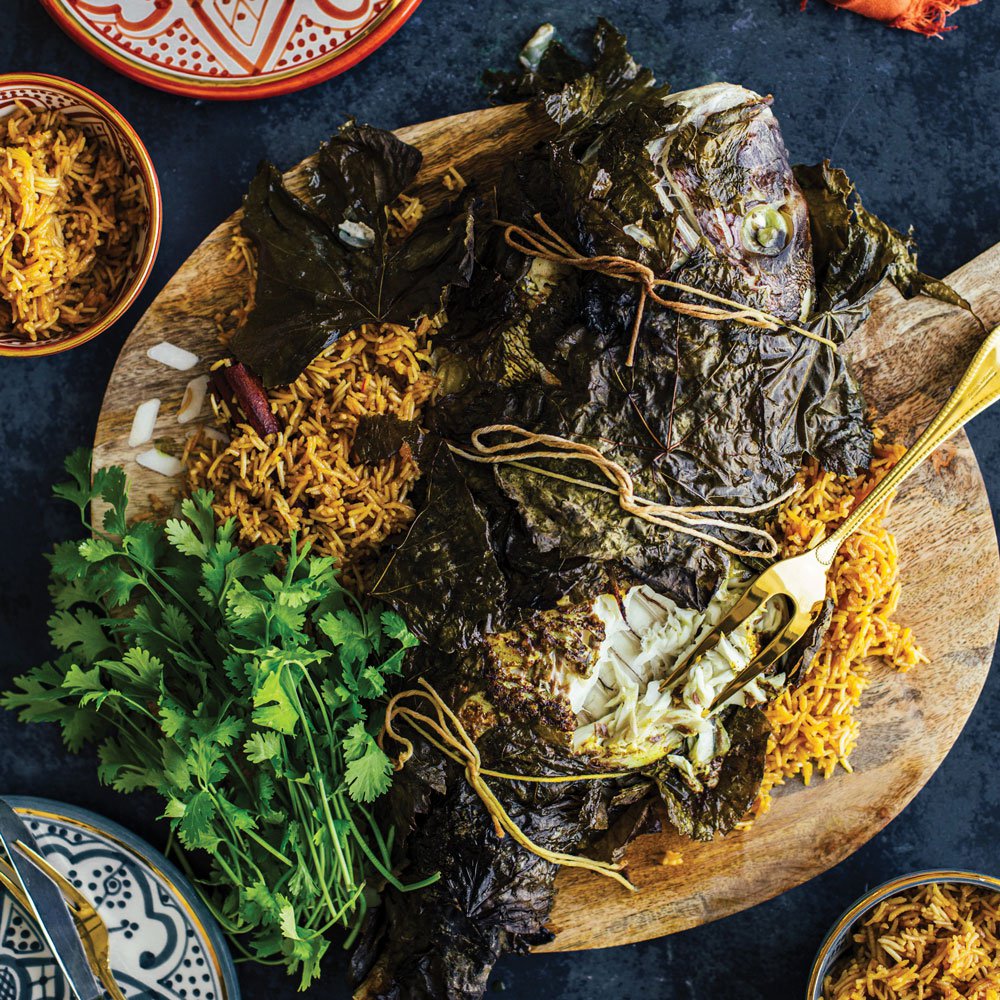 Vine leaf baked whole fish with sweet-savoury rice recipe - Spinneys ...