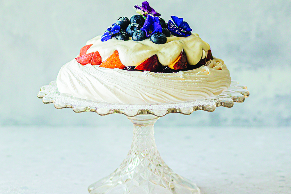 Peach melba pavlova with blueberry sauce recipe - Spinneys UAE