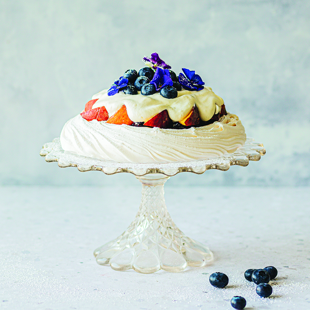 Peach melba pavlova with blueberry sauce recipe - Spinneys UAE